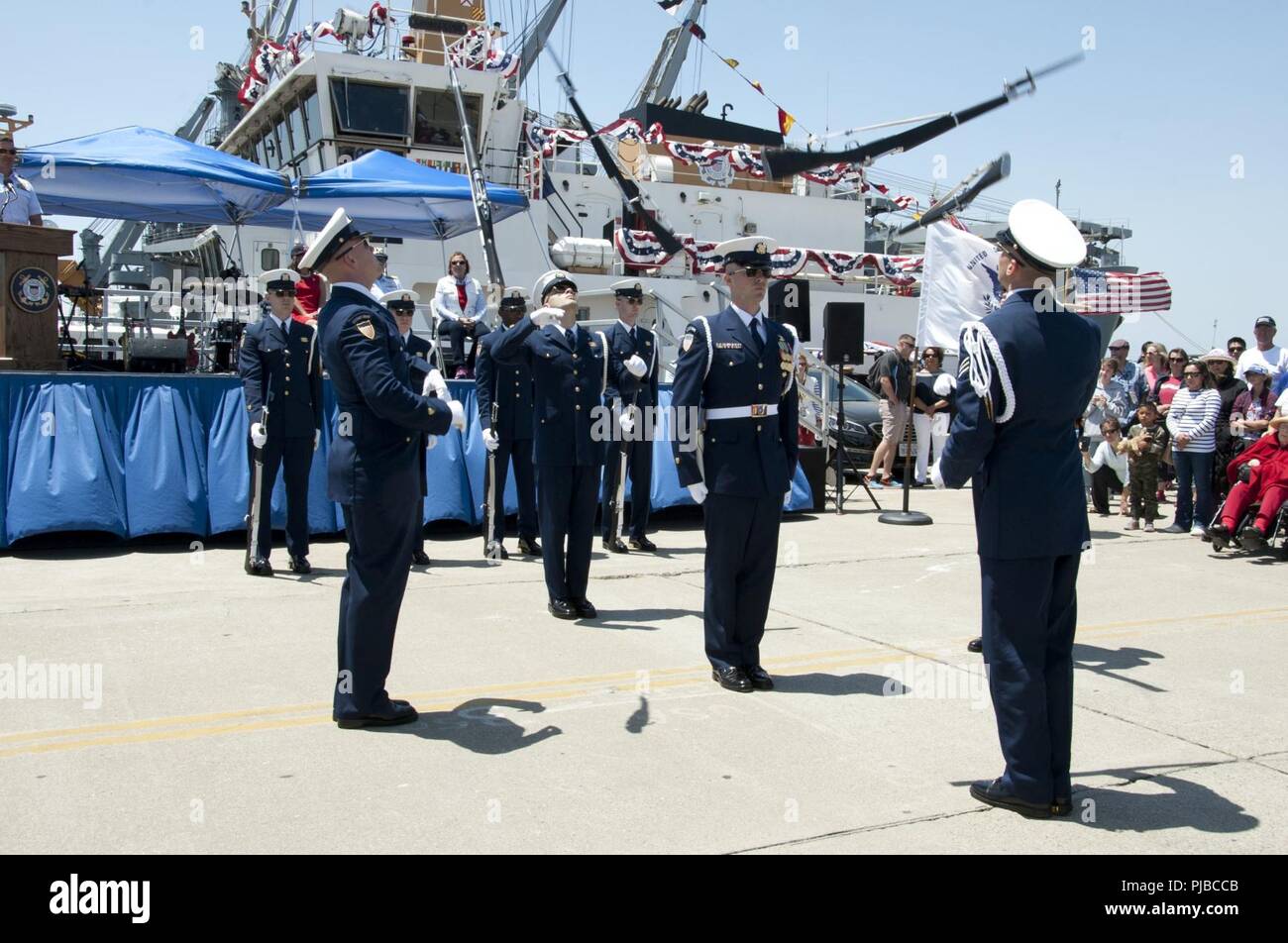 The U.S. Coast Guard Ceremonial Honor Guard Silent Drill Team performs ...