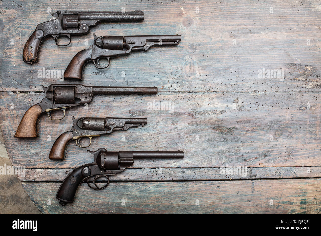 Historic gun in a museum exhibit or collectors showcase displayed on a ...