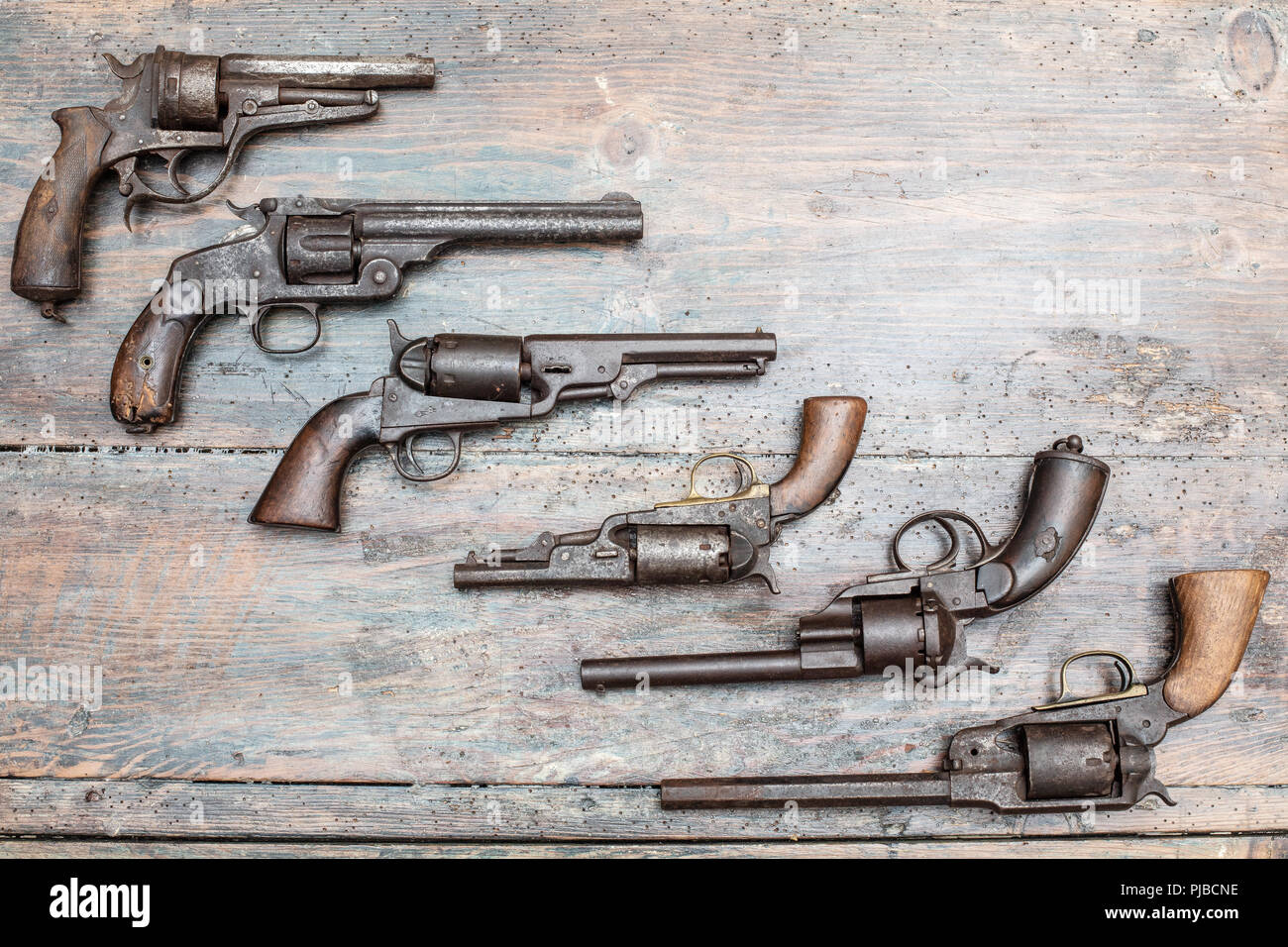 Historic gun in a museum exhibit or collectors showcase displayed on a ...