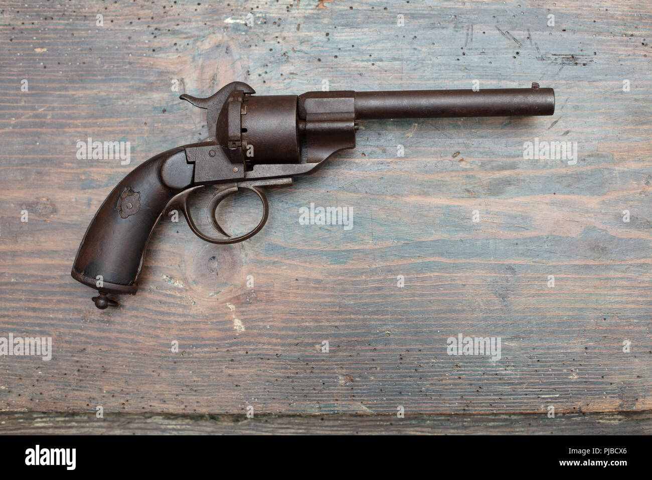 Historic gun in a museum exhibit or collectors showcase displayed on a ...