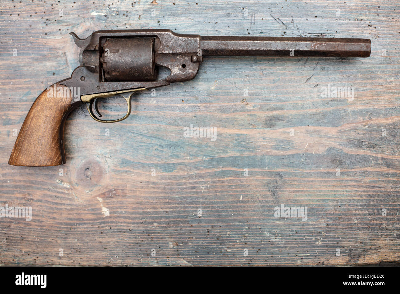 Historic gun in a museum exhibit or collectors showcase displayed on a ...