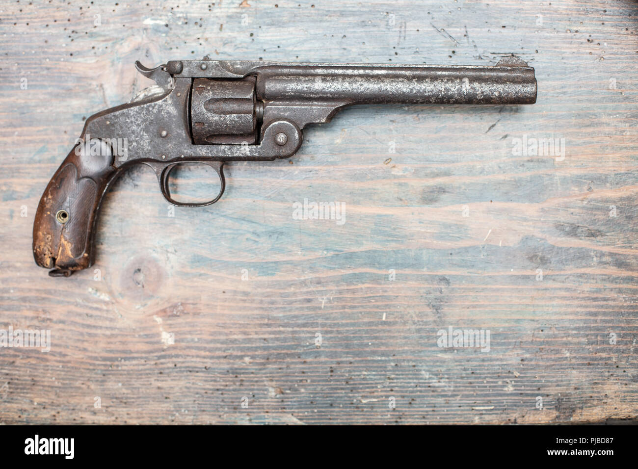 Historic gun in a museum exhibit or collectors showcase displayed on a ...