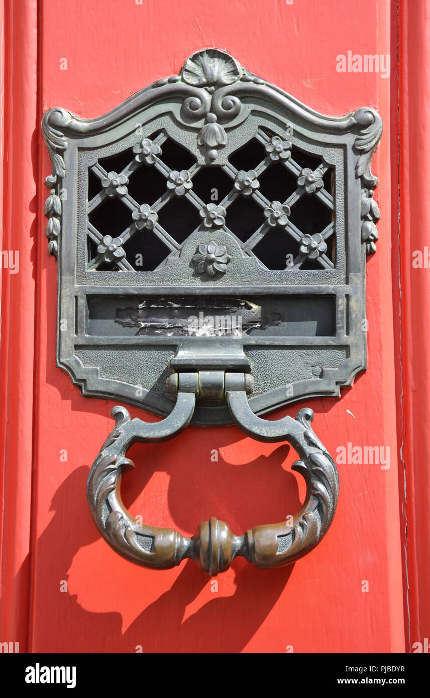 Old metal door handle Stock Photo - Alamy