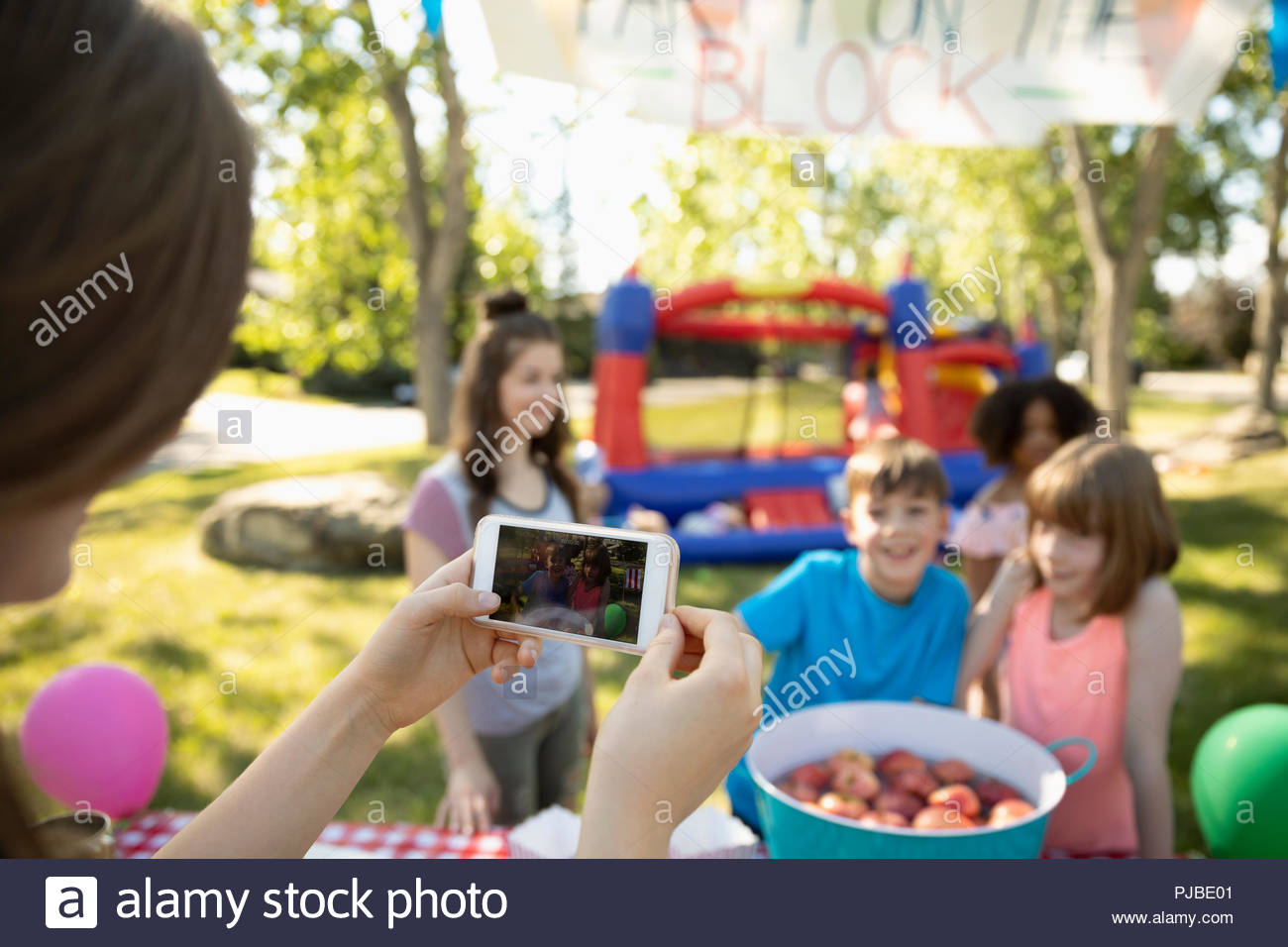Child bobbing apple hi-res stock photography and images - Alamy