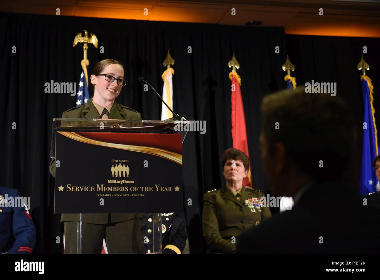 U.S. Marine Corps Sgt. Brooke Sharp addresses the attendees at the 2018 ...