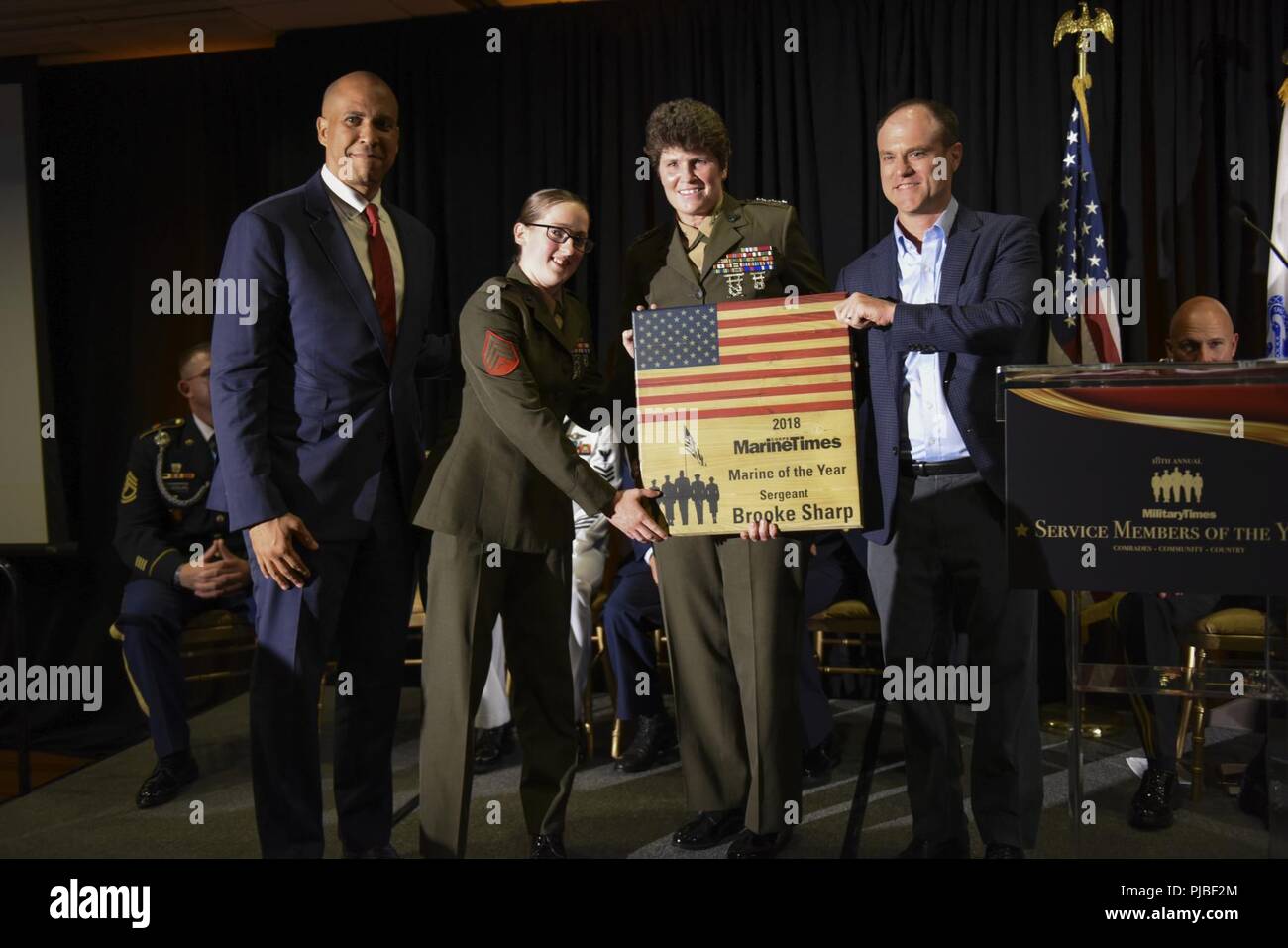 U.S. Marine Corps Sgt. Brooke Sharp poses for a photo with Lt. Gen ...