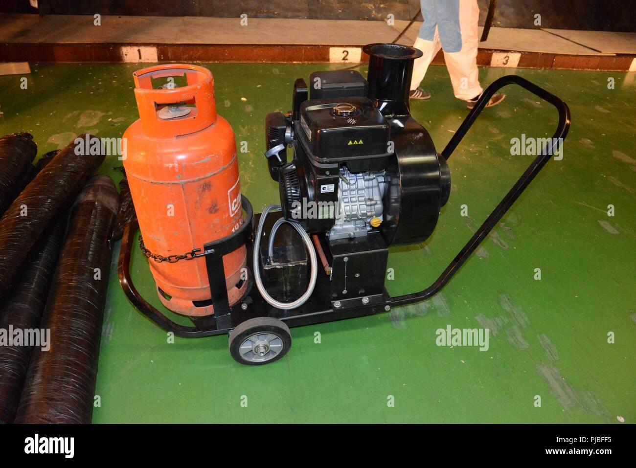 A vacuum is used to separate rubber granular and lead bullets during ...