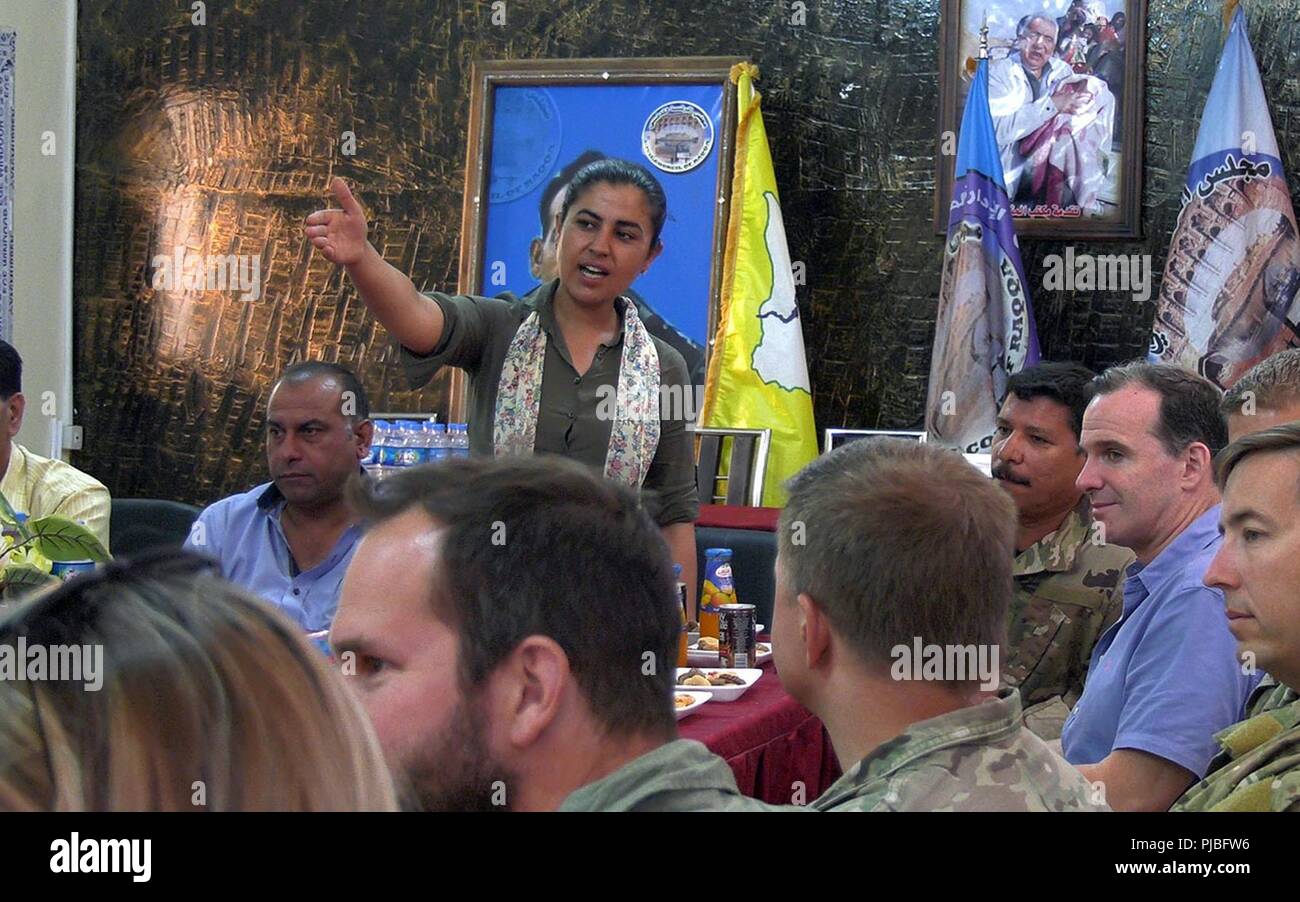 Laila Mustafa, co-president of the Raqqah Civil Council, introduces her ...