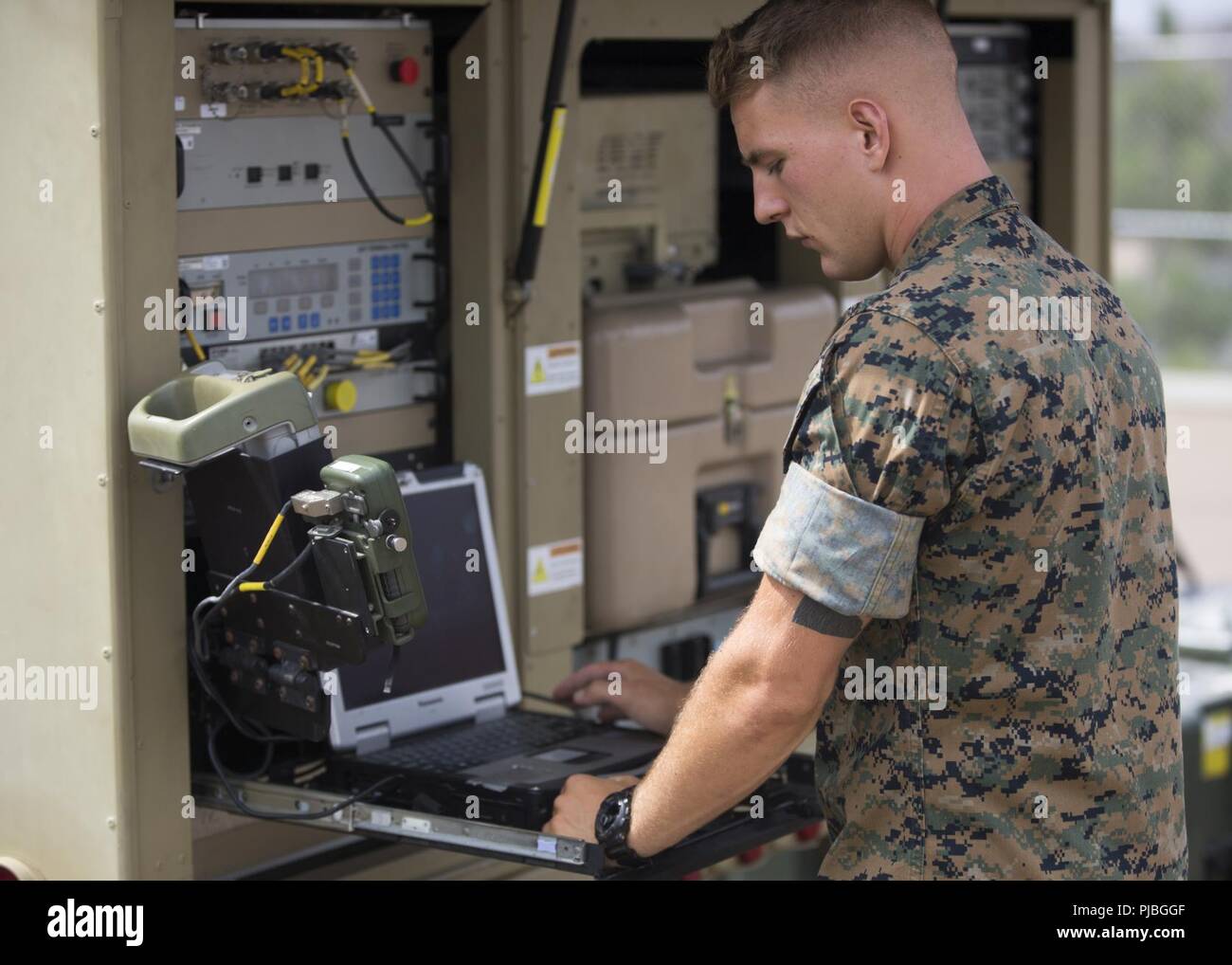 U.S. Marine Corps Cpl. Chase Swenson, satellite communications operator ...