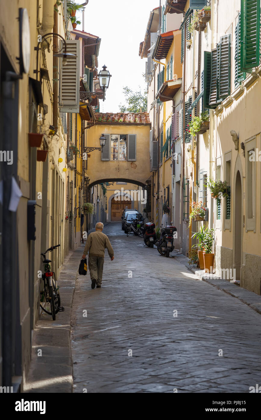 Man walking morning old town hi-res stock photography and images - Alamy