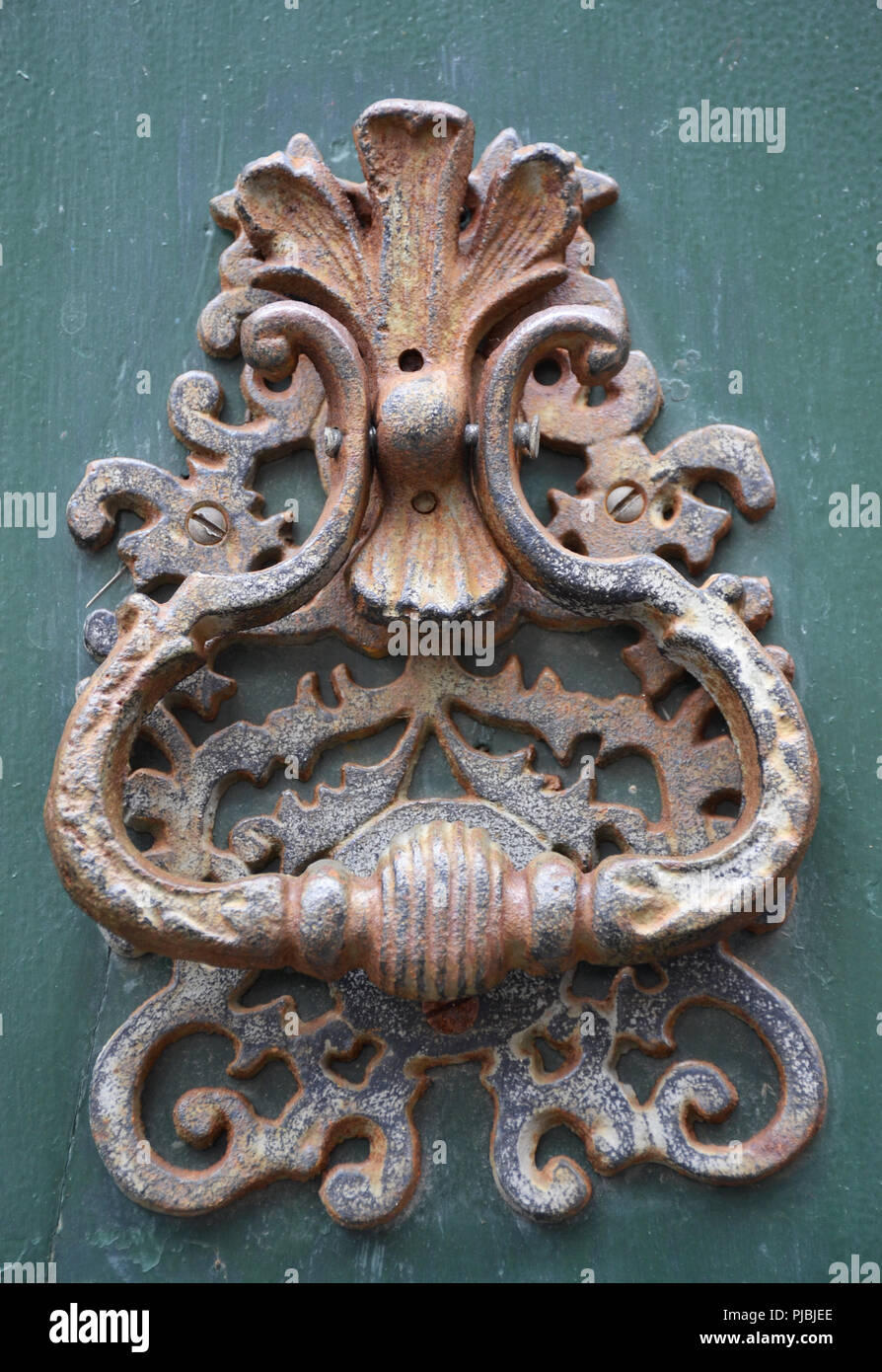 Old metal door handle Stock Photo - Alamy