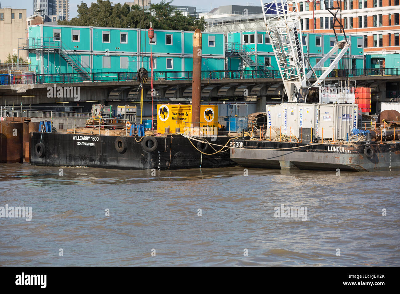 Construction Barges on the River Thames Stock Photo - Alamy