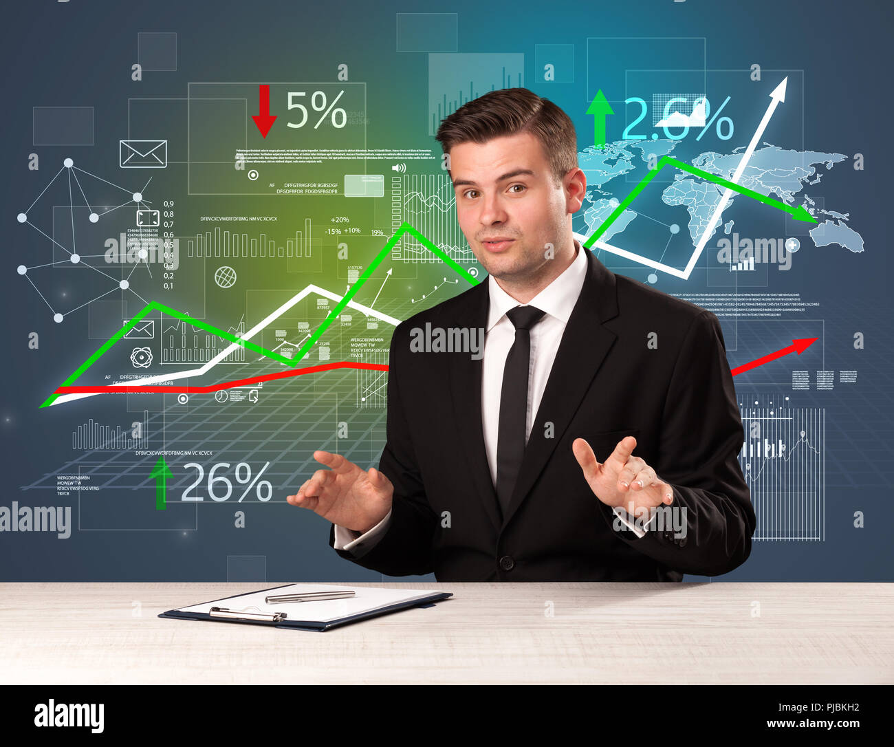 Young handsome businessman sitting at a desk with stocks and progress ...