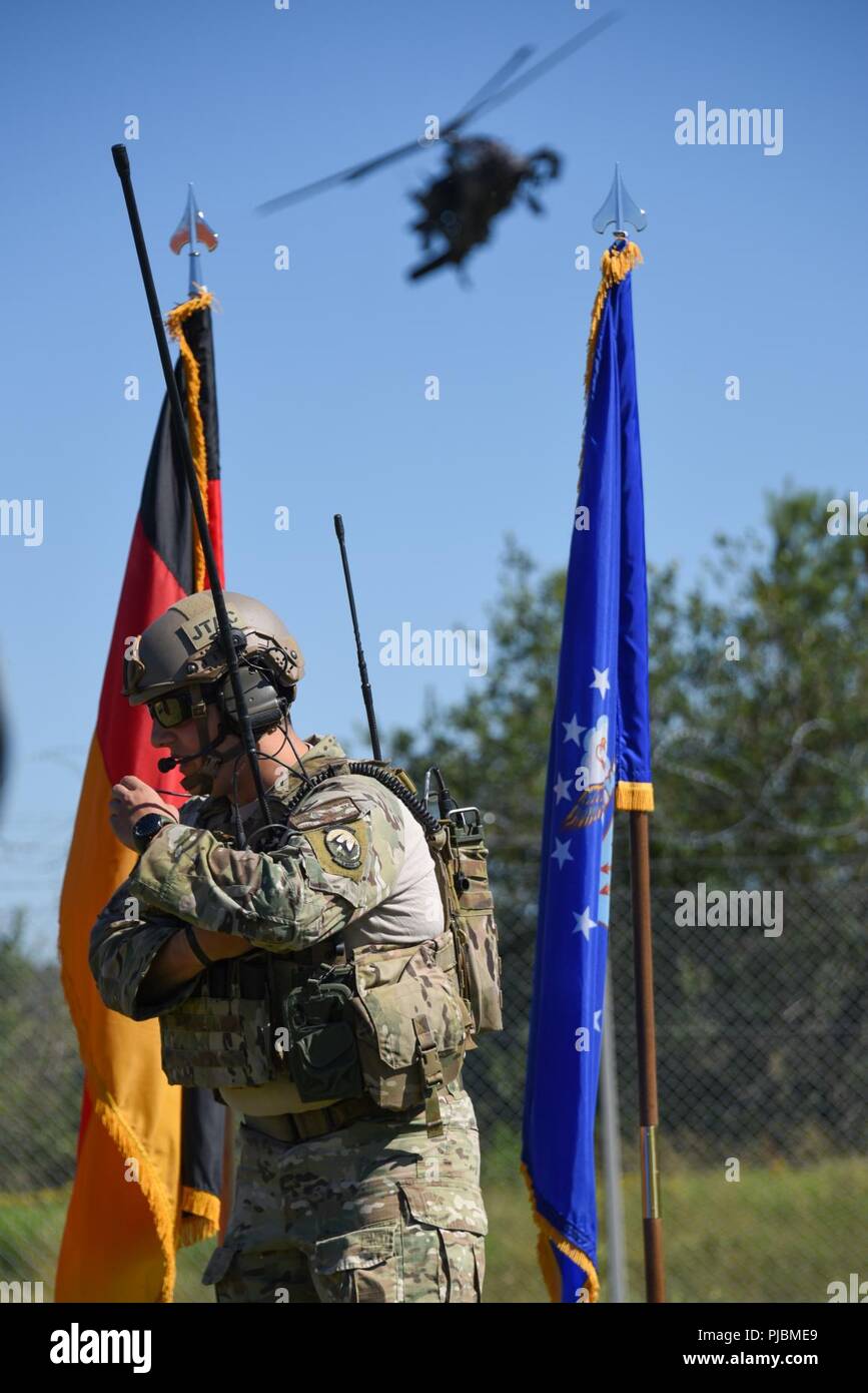 An U.S. Airman with 2d Air Support Operations Squadron uses a radio to ...