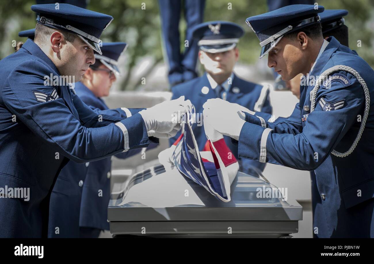 The flag-folding portion of the Honor Guard graduation ceremony begins ...