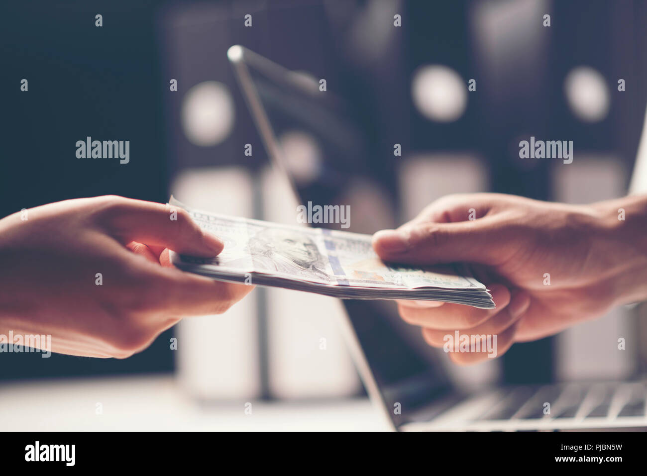 Close-up Of Person Hand Giving Money To Other Hand Stock Photo - Alamy