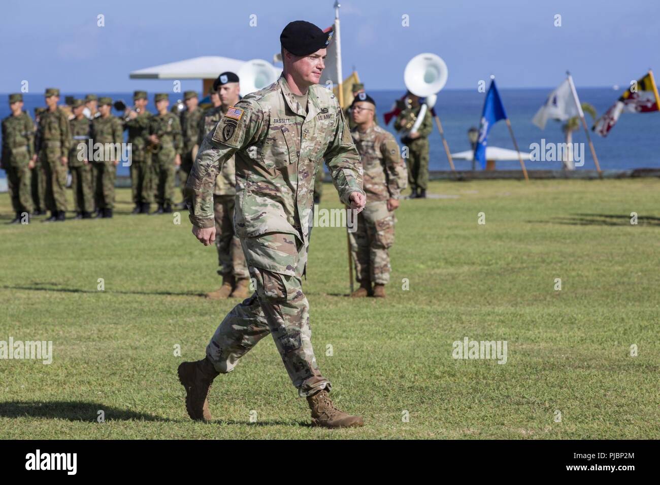 TORII STATION, OKINAWA, Japan – Maj. Travis J. Bassett marches during ...