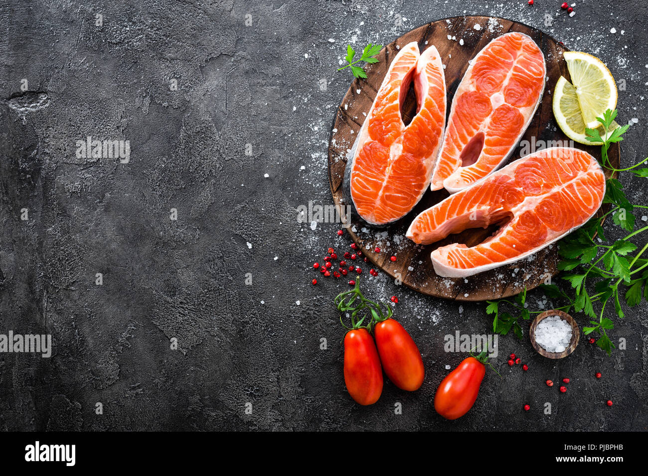 Raw salmon fish. Fresh salmon steaks Stock Photo - Alamy