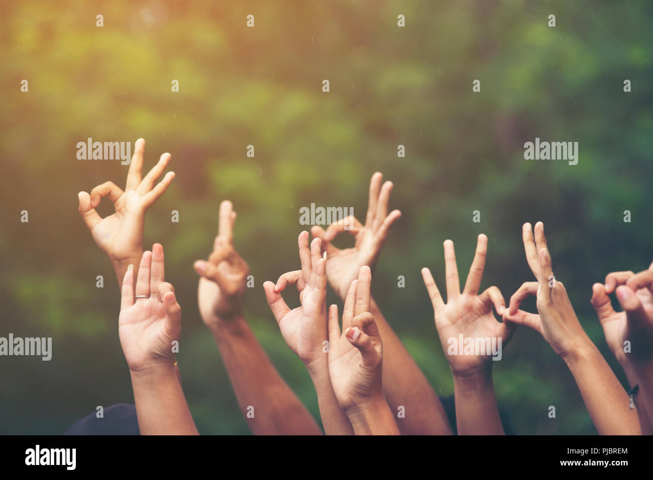 hand up of people working assemble corporate meeting show symbol Join ...