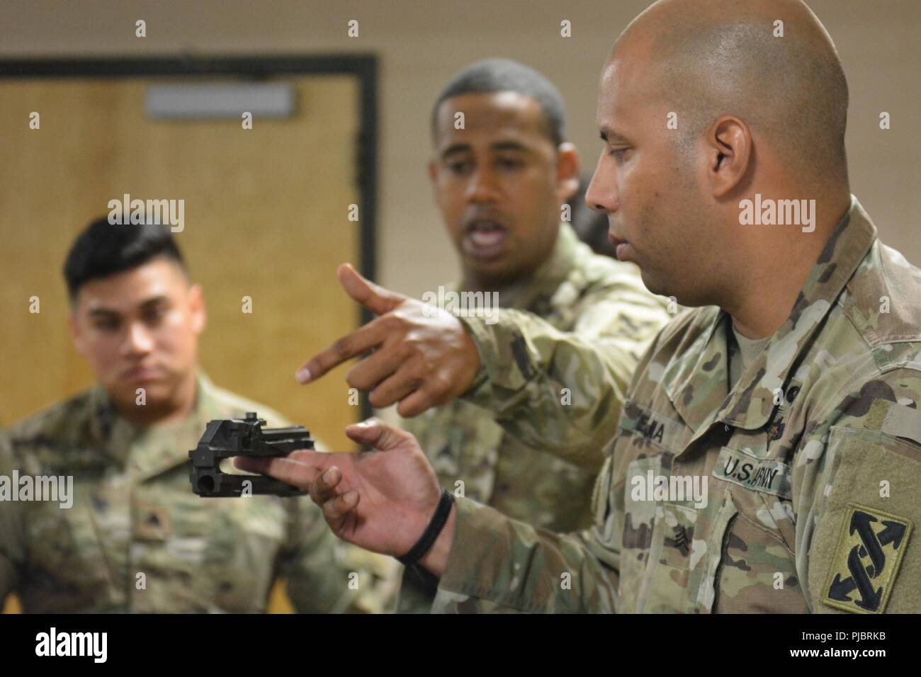 U.S. Army Reserve Sgt. Josh Pena, preliminary marksmanship instructor ...