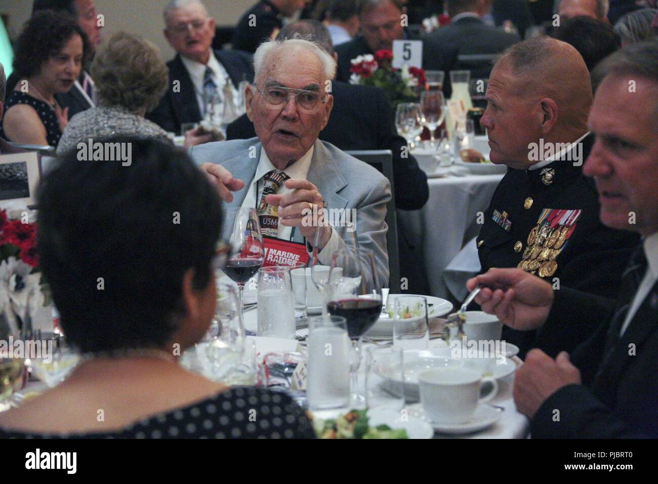 Commandant of the Marine Corps Gen. Robert B. Neller speaks with a ...