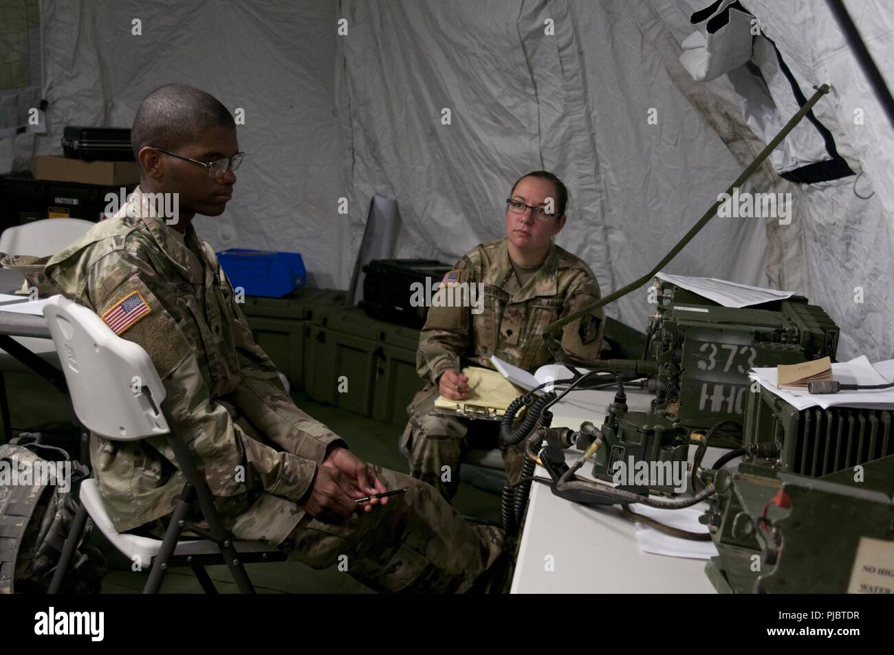 Spc. Korton Moore, left, a native of Jacksonville, Florida, and Spc ...