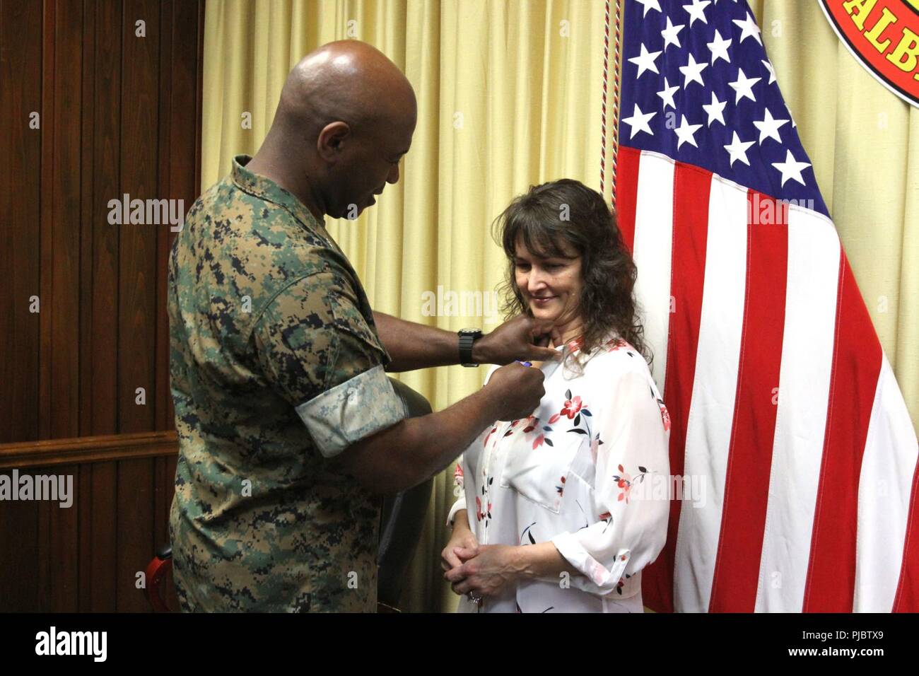 MCLB Albany Commanding Officer Colonel Alphonso Trimble (left) presents ...
