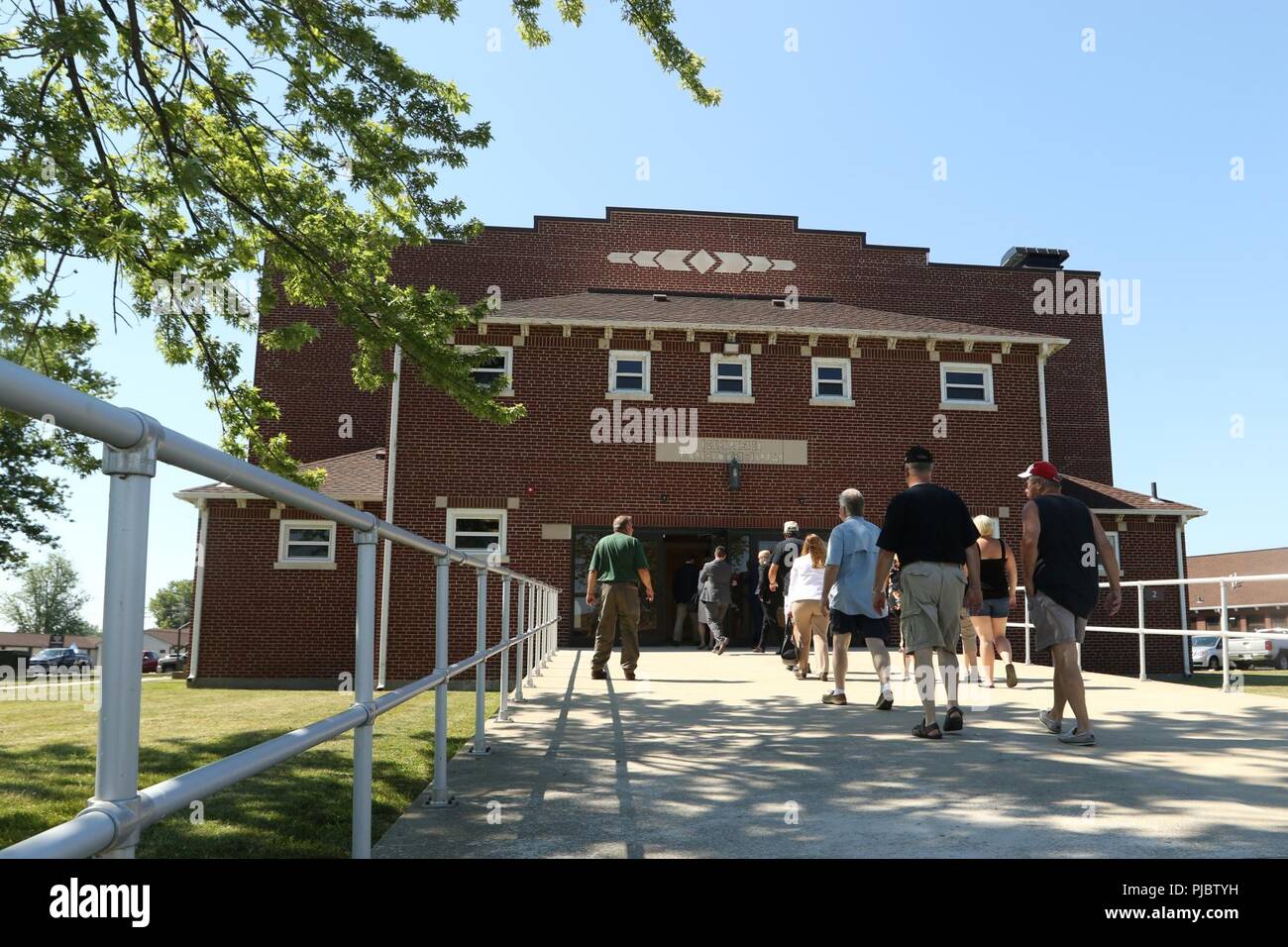 Attendees enter the doors to Hough Auditorium to witness the grand ...