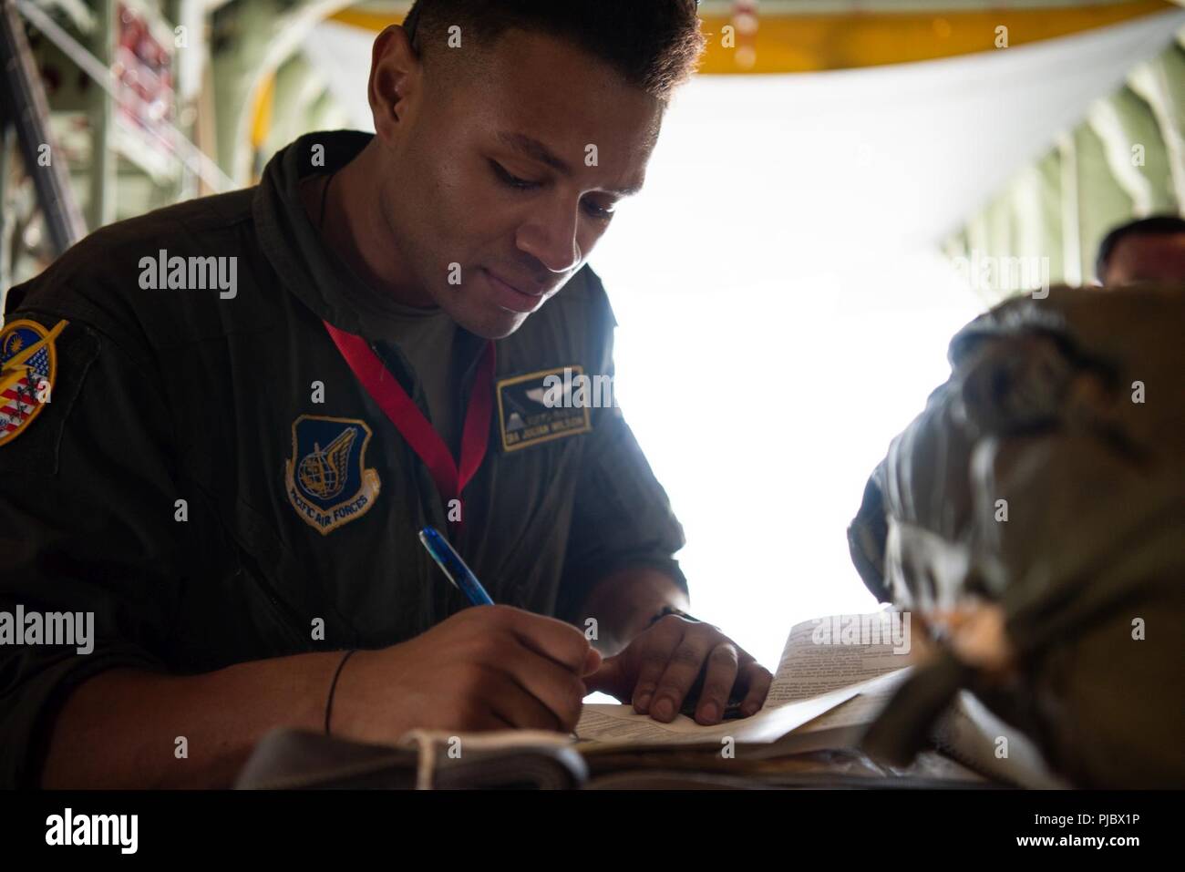 U.S. Air Force Senior Airman Julian Wilson, Yokota Air Base C-130J ...