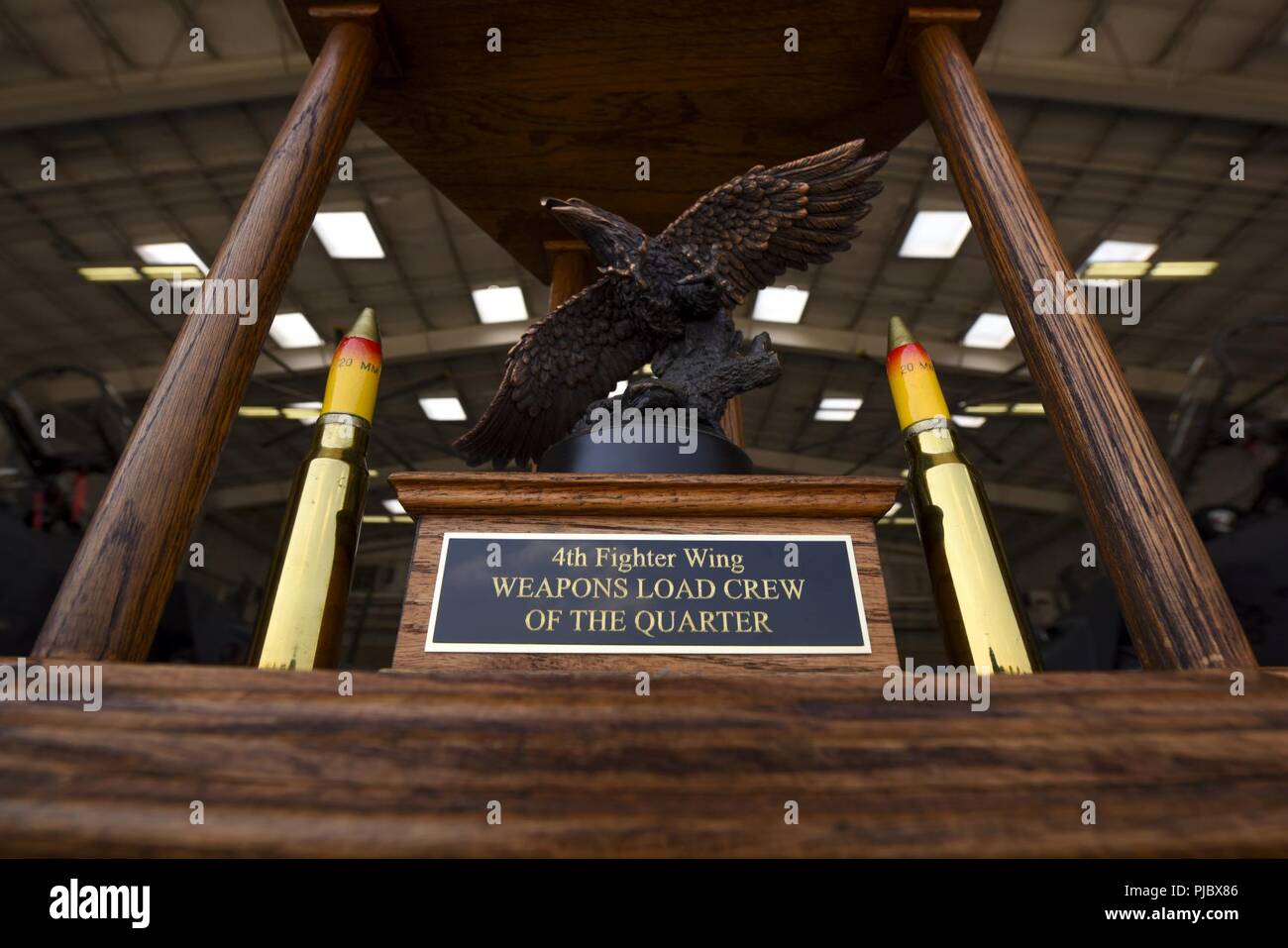 The Weapons Load Crew of the Quarter trophy is on display during the ...