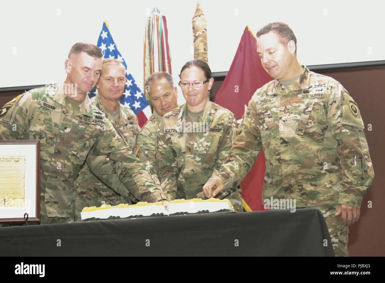 Soldiers participate in a ceremonial cake cutting July 9, at the Cole ...