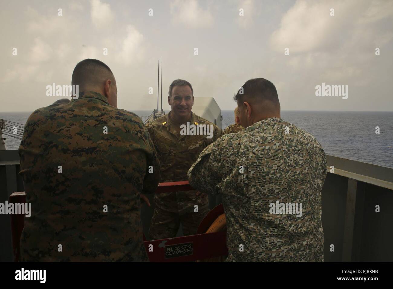 Chilean Navy Capt. Jorge Keitel, center, a special advisor with Special ...