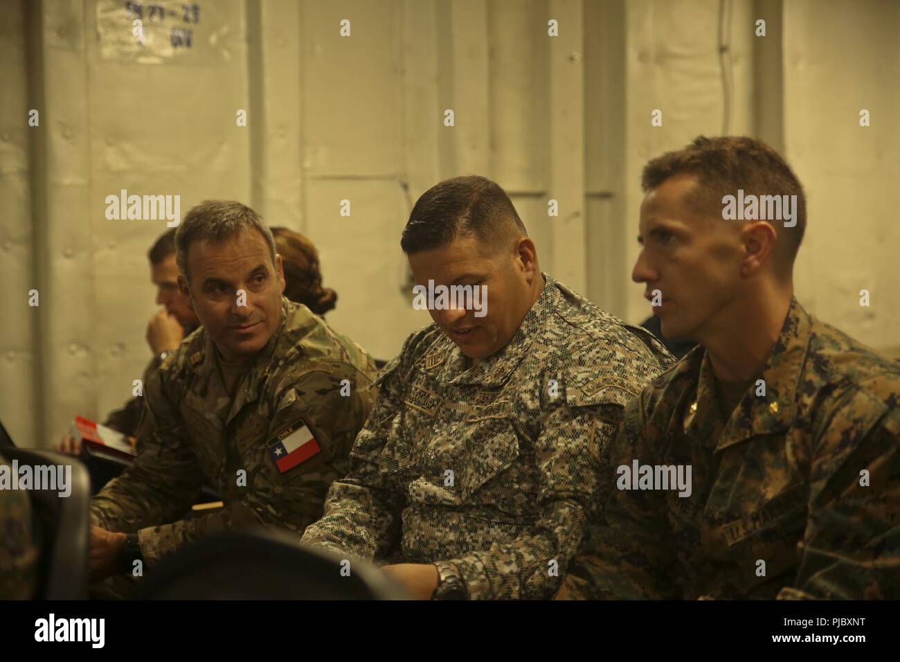 Chilean Navy Capt. Jorge Keitel, left, a special advisorwith Special ...