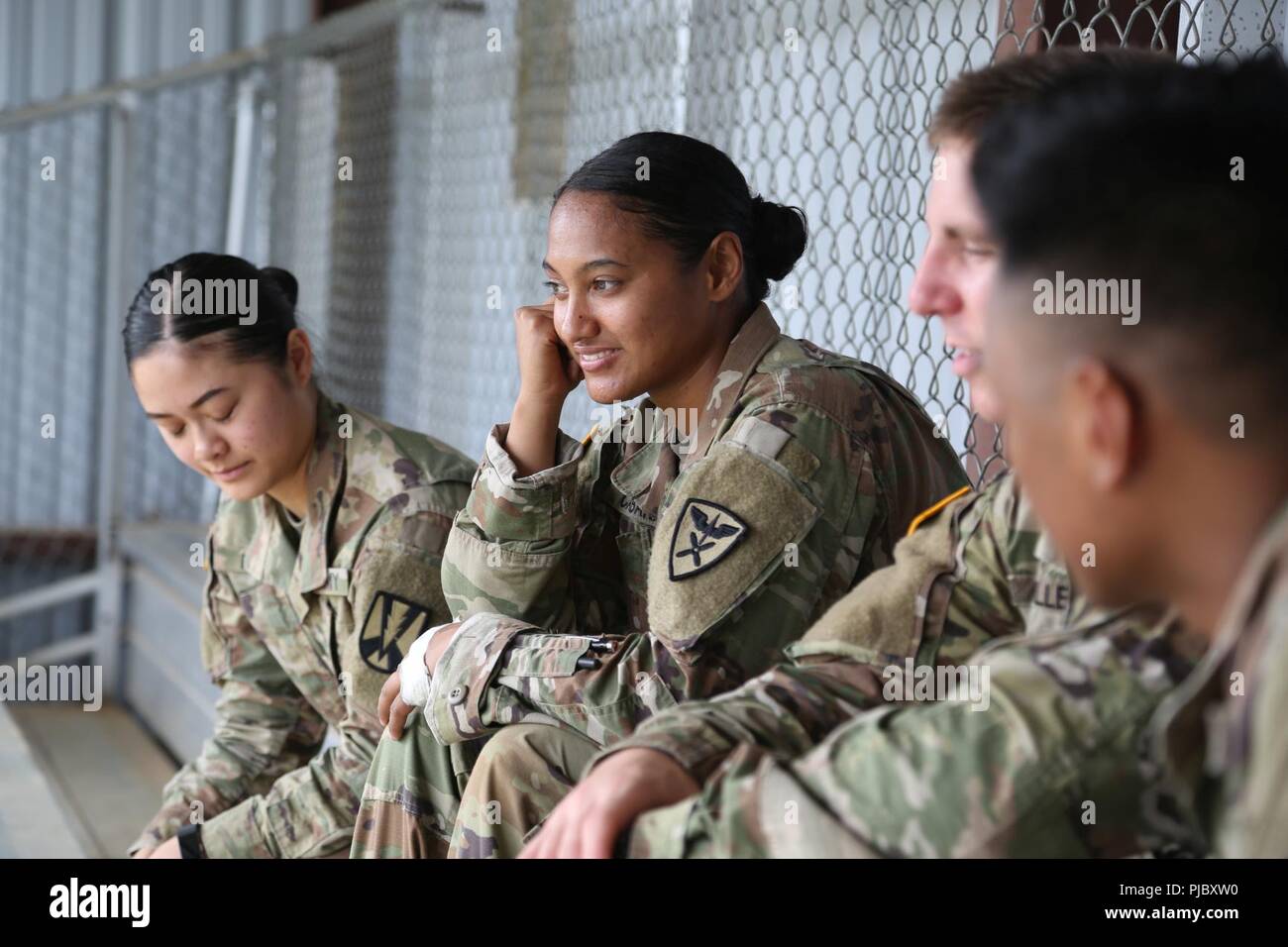U.S. Army Soldiers from various units talk to each other during the ...