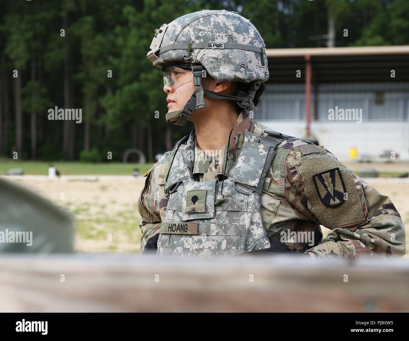 Spc. Diane Hoang from the U.S. Army Training Center zeros her weapon ...