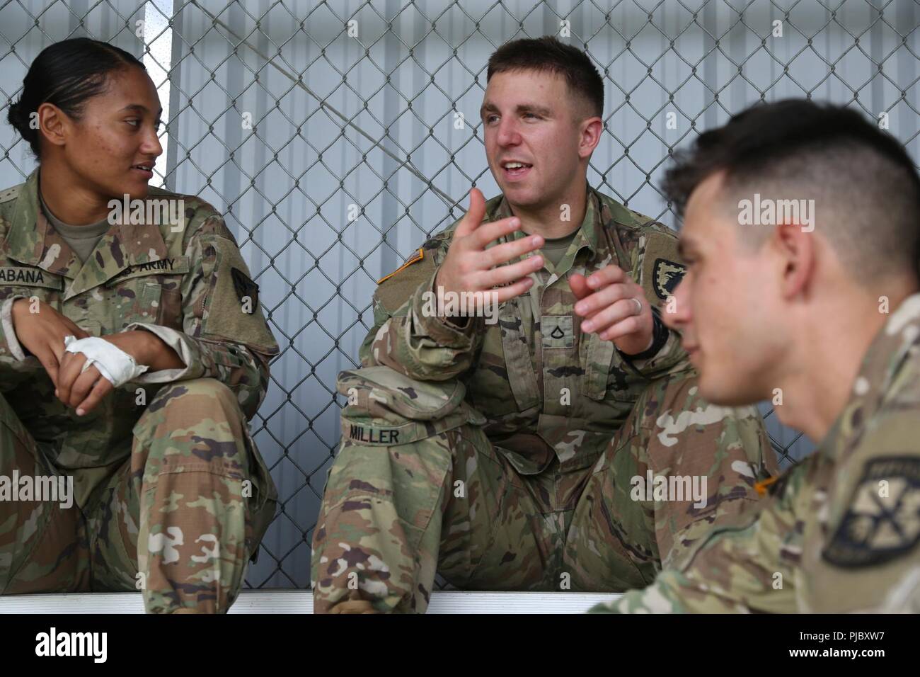 U.S. Army Soldiers from various units talk to each other during the ...