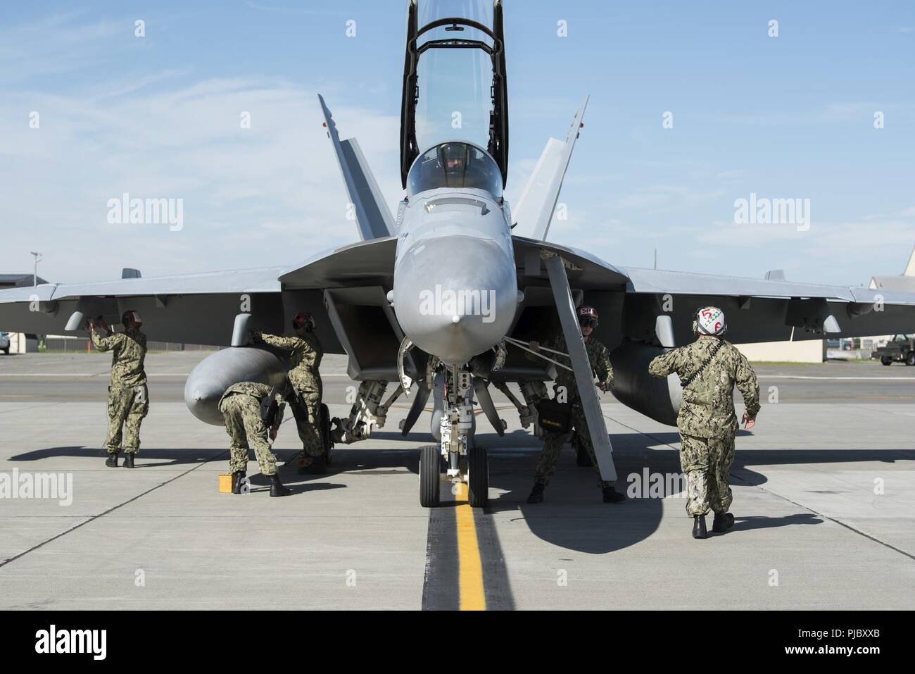 U.S. Navy Sailors with the Electronic Attack Squadron (VAQ-139), from ...