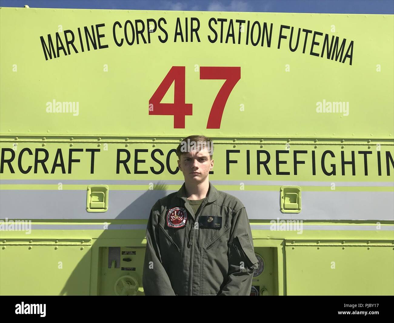 CAMP FOSTER, OKINAWA, Japan – Lance Cpl. Justin Simons poses for a ...