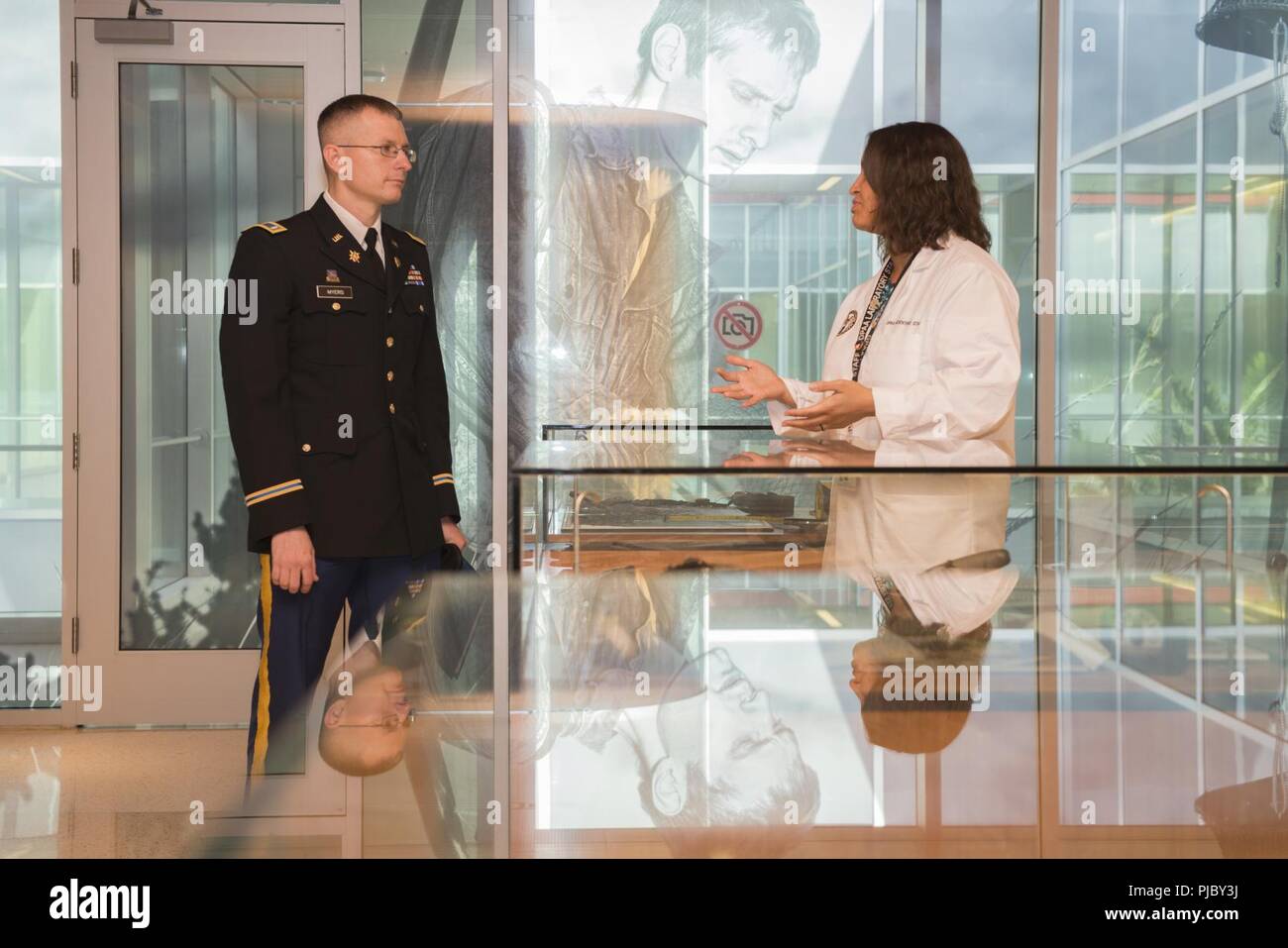 U.S. Army 1st Lt. Jason Myers, left, receives a brief from Dr. Veronica ...