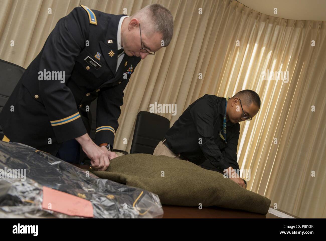 U.S. Army 1st Lt. Jason Meyers, Special U.S. Army Escort, left, and ...