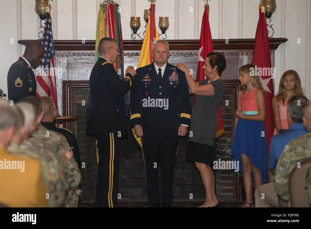 LTG Theodore Martin and wife Carolyn Evans attach the rank to newly ...