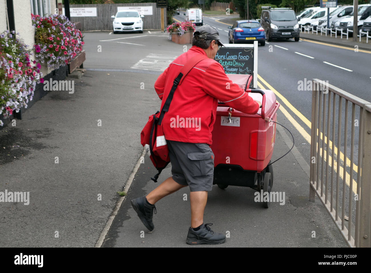 Postman cart trolley hi-res stock photography and images - Alamy