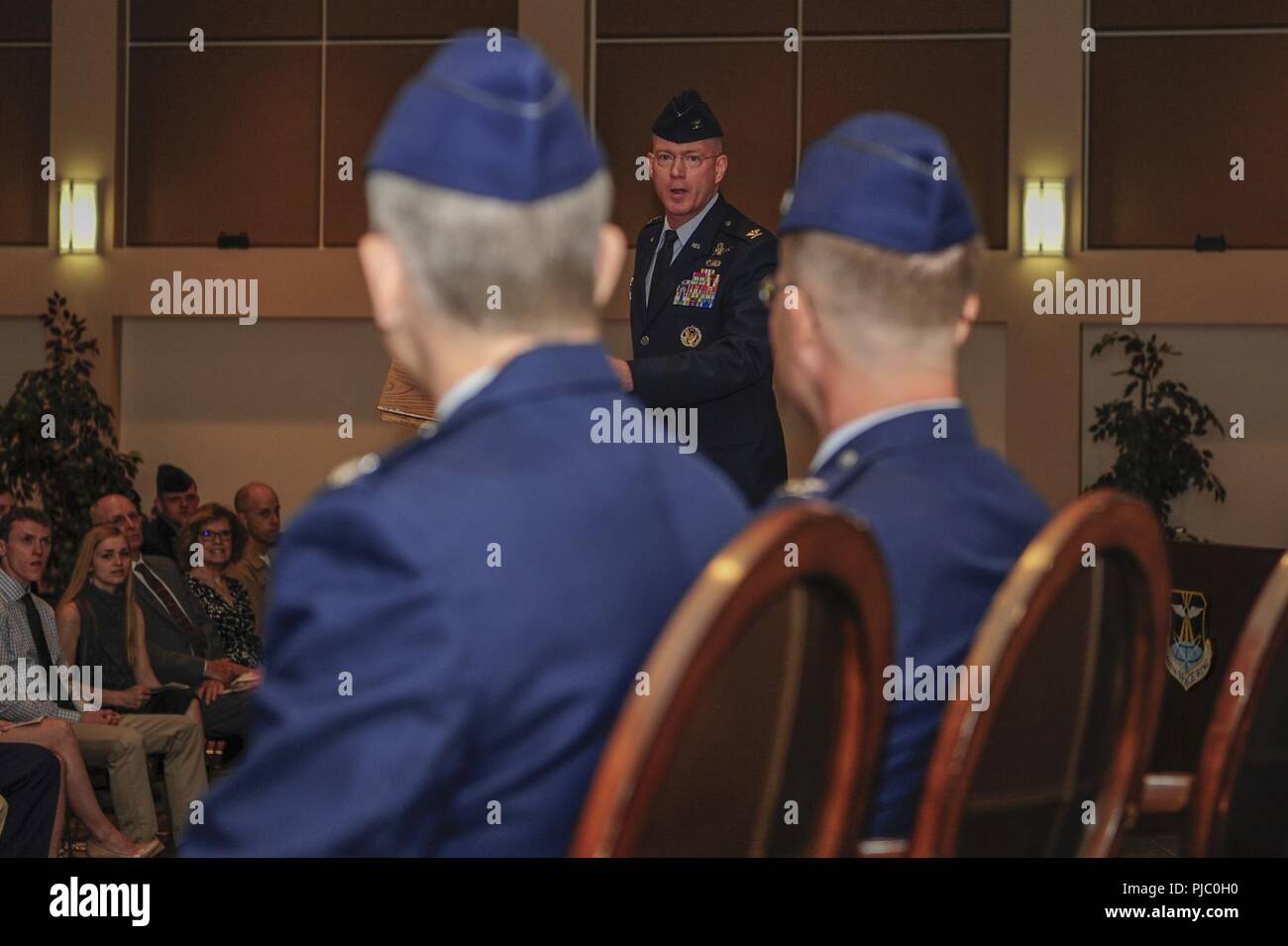 Col. Troy Endicott, 460th Space Wing commander, speaks at a change of ...