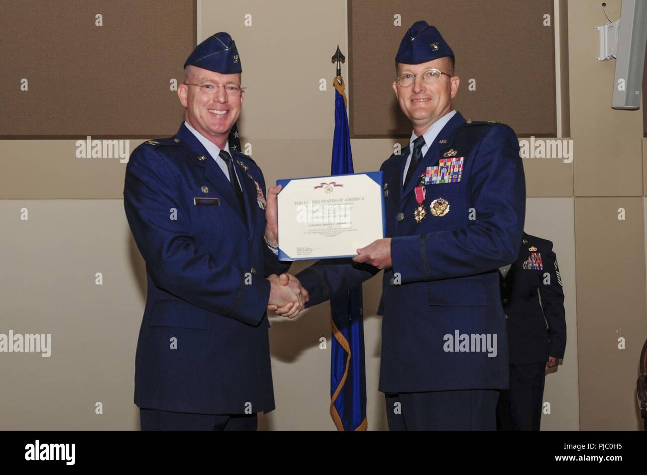 Col. Troy Endicott, 460th Space Wing commander, gives the Legion of ...