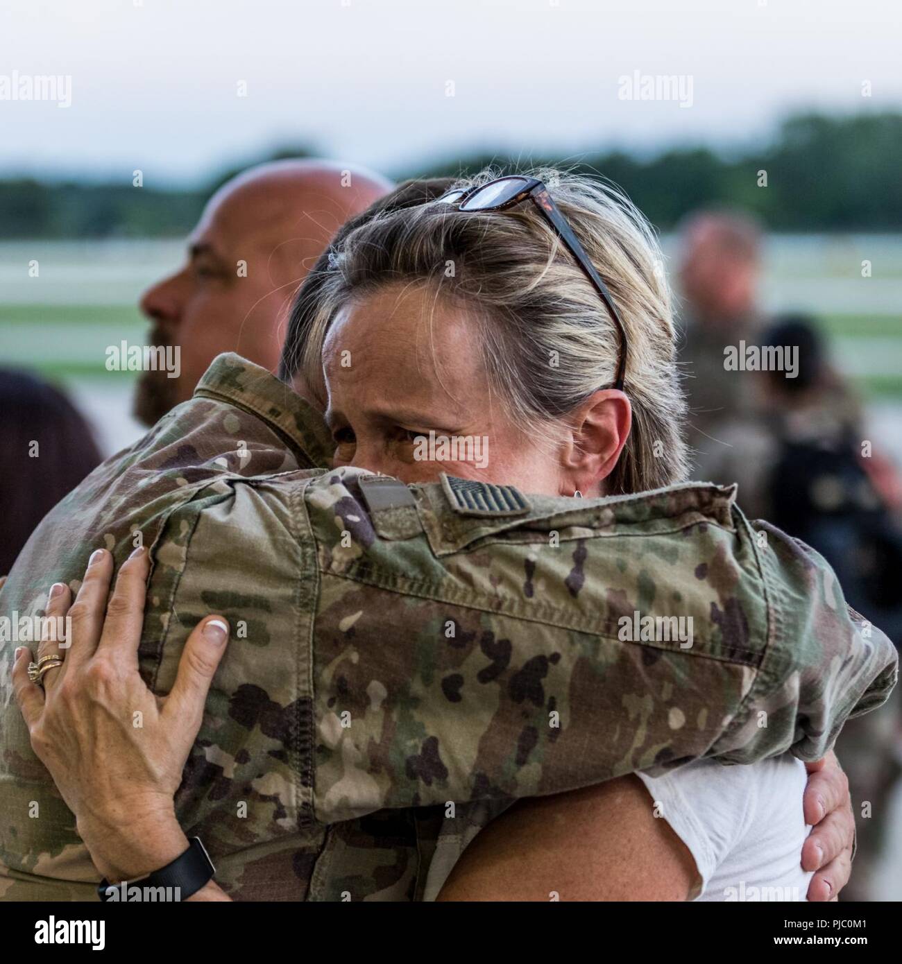 Welcome Hug At Airport High Resolution Stock Photography and Images - Alamy