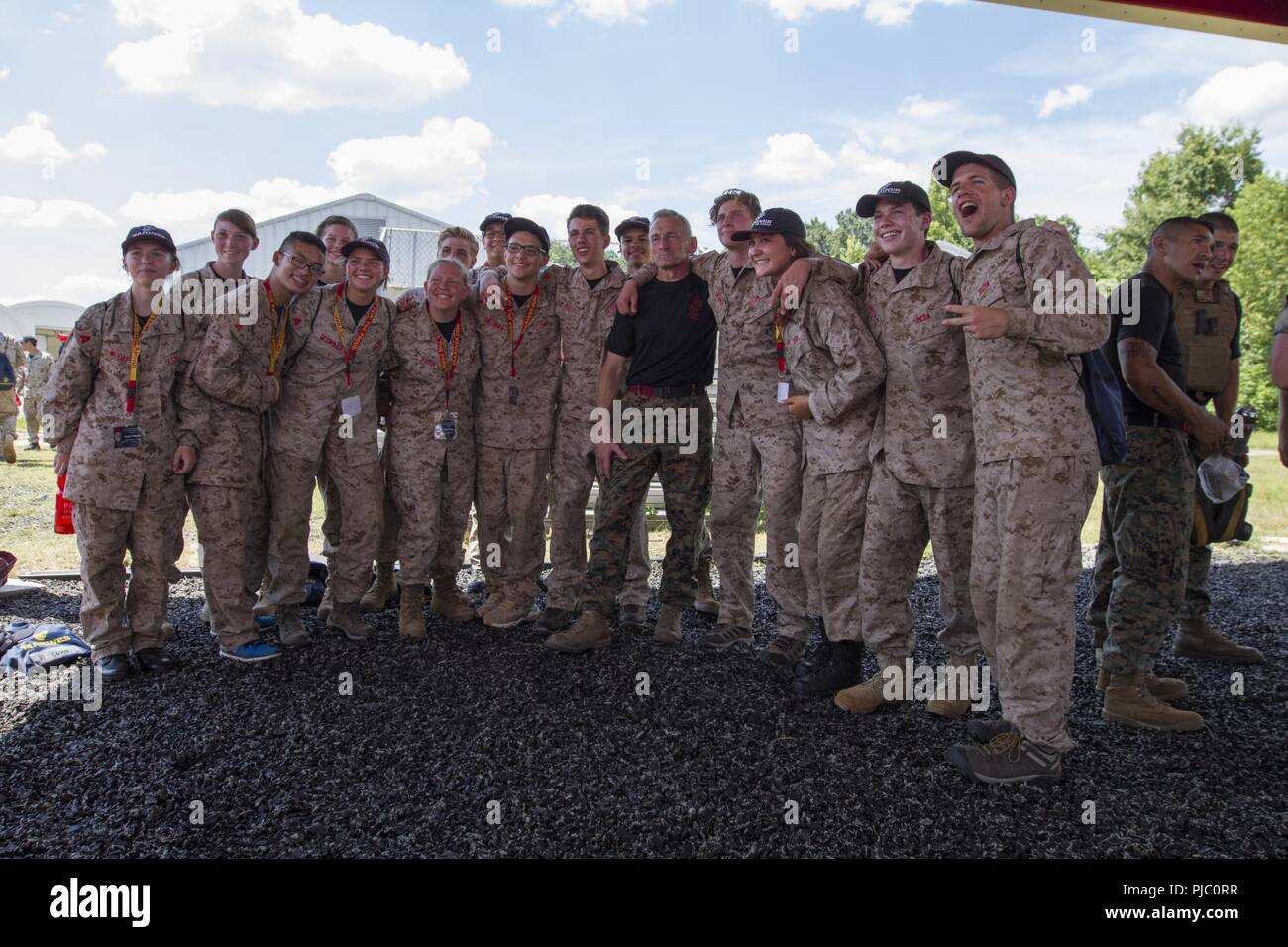 Retired Marine Lt. Col. Joseph Shusko posed for a group photo with ...