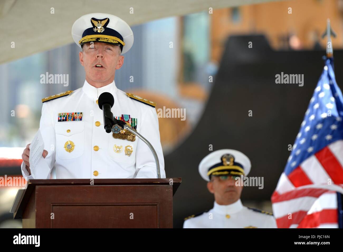 Rear Adm. Kevin E. Lunday speaks at a Coast Guard 14th District change ...