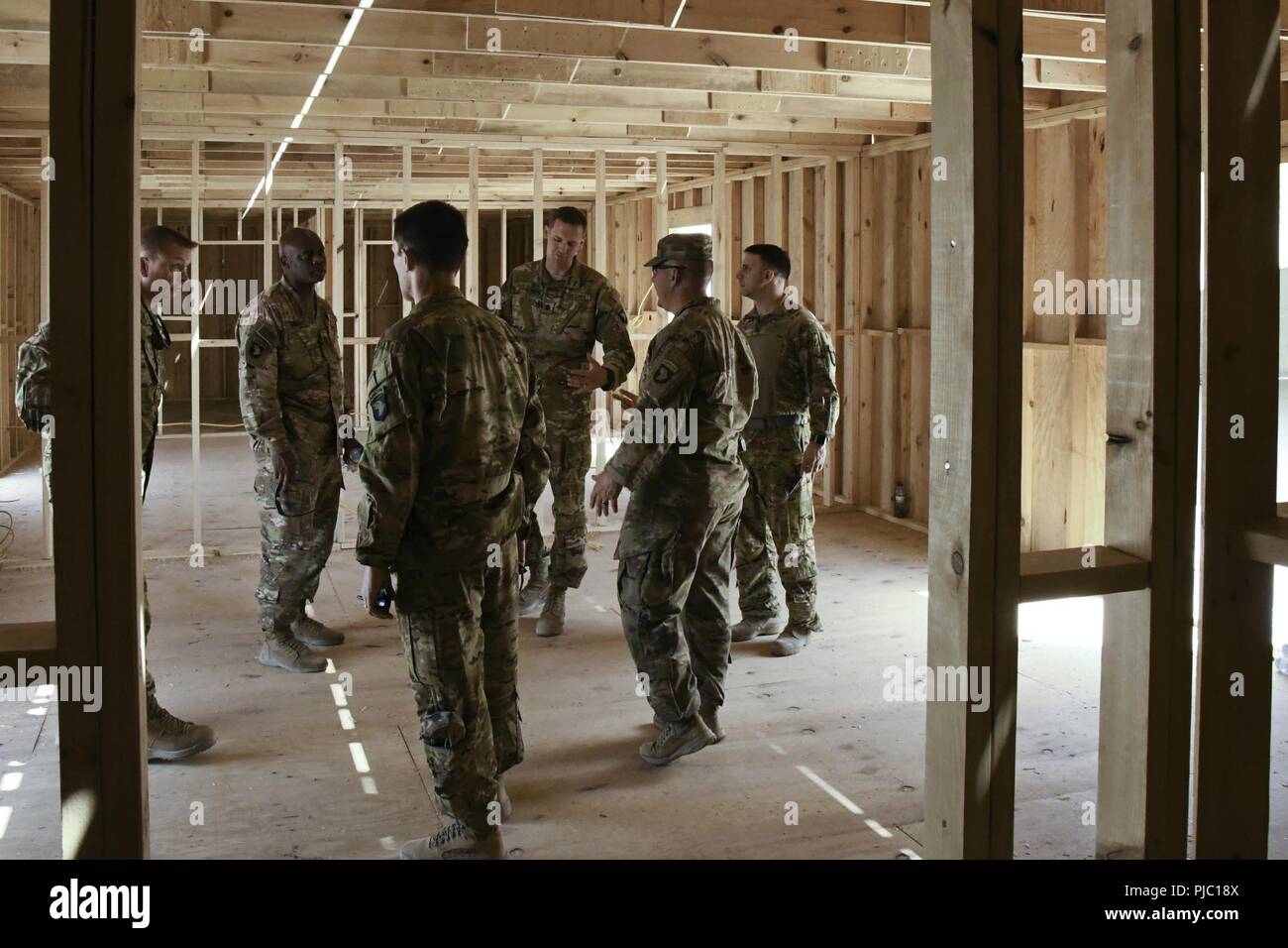 Task Force leadership discuss ongoing construction projects Stock Photo ...