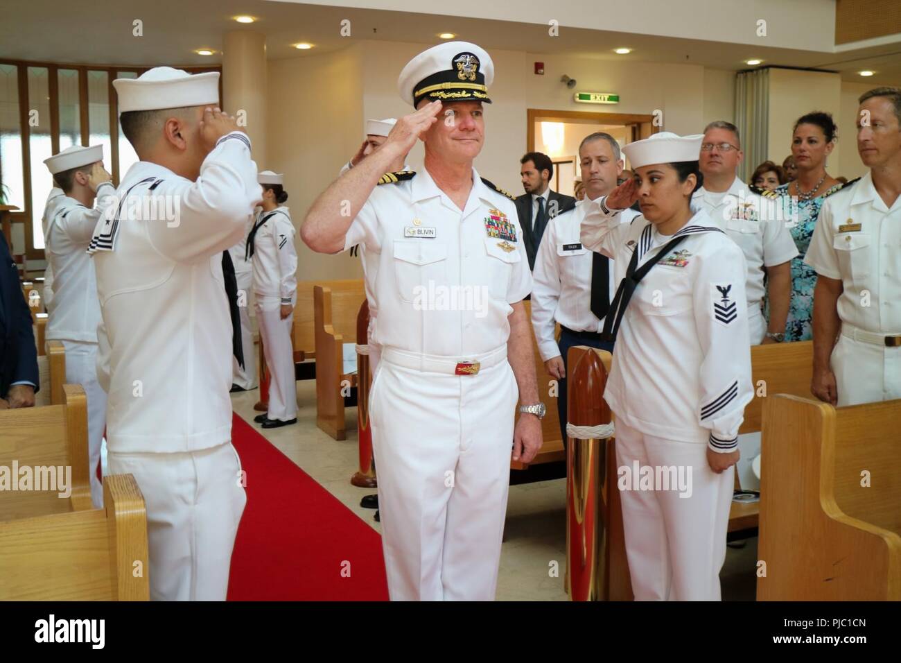 Captain Steven Blivin bids a final salute as the commanding officer of ...