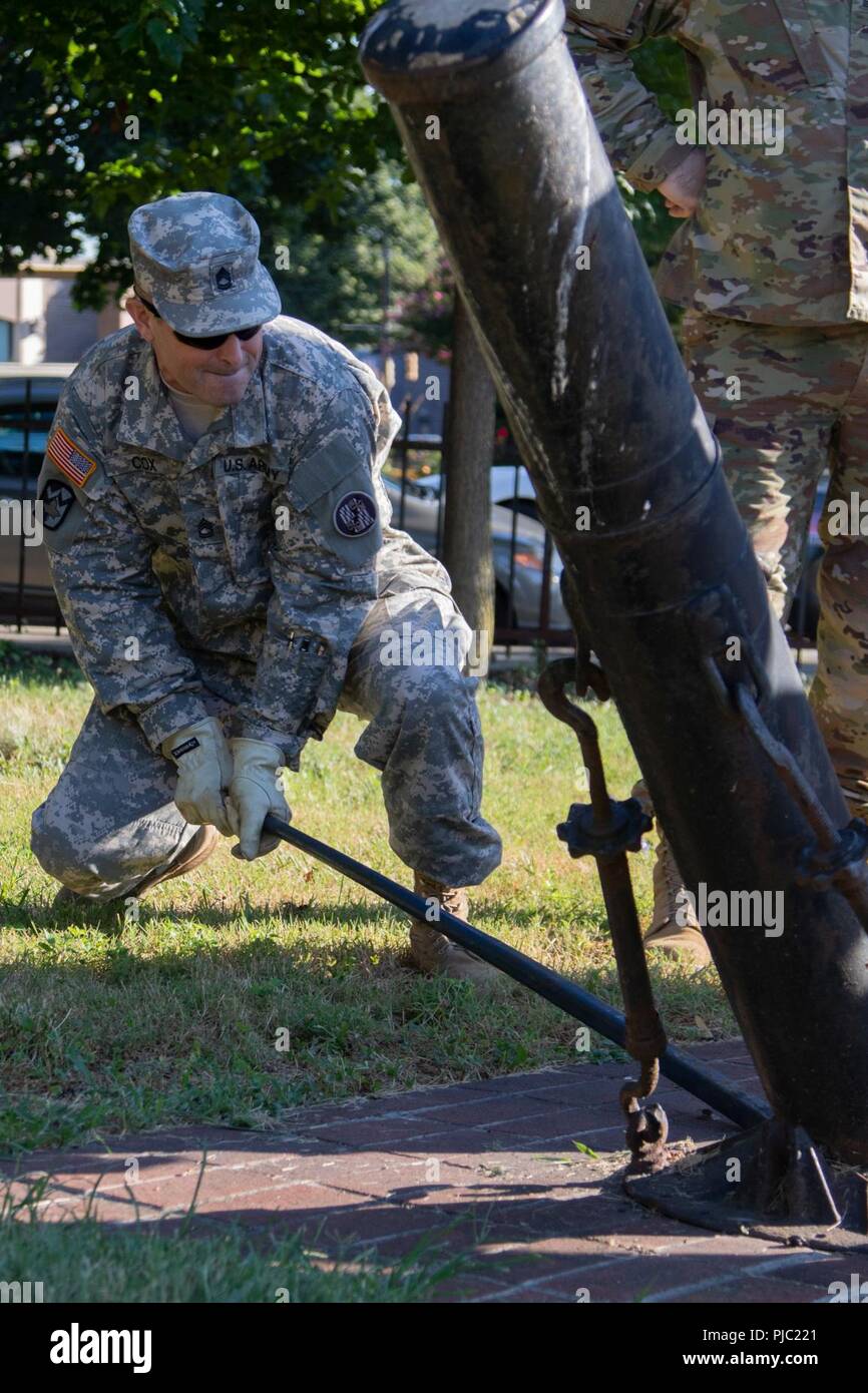 Sgt. First Class Jeff Cox, Combined Support Maintenance Shop, uses a ...